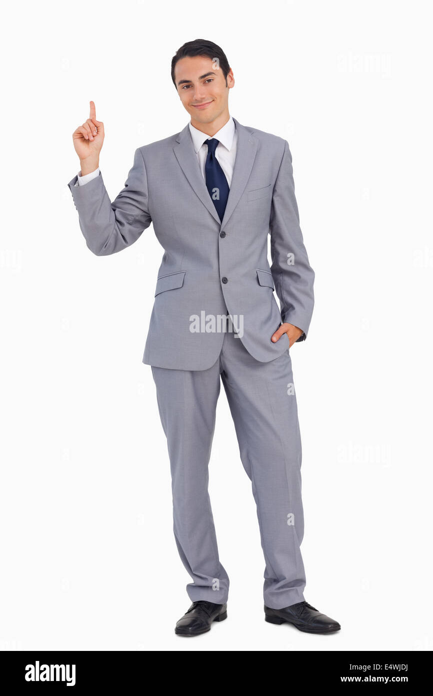 Smiling man in suit pointing Cut Out Stock Images & Pictures - Alamy