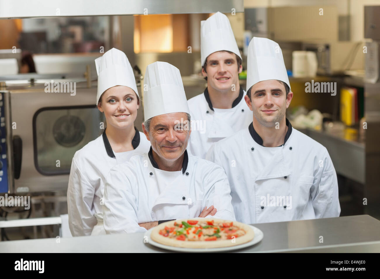 Happy group of Chef's Stock Photo - Alamy
