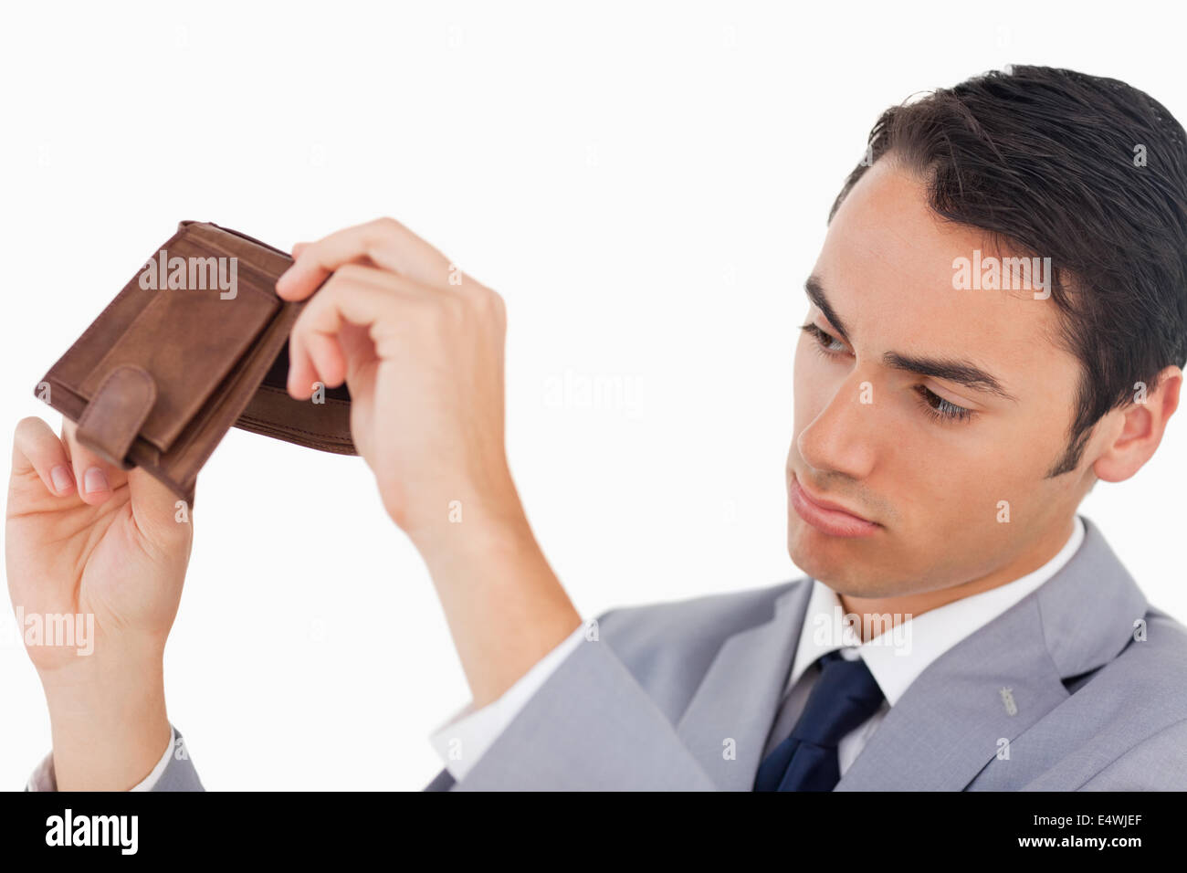 Man in a suit with his wallet empty Stock Photo - Alamy