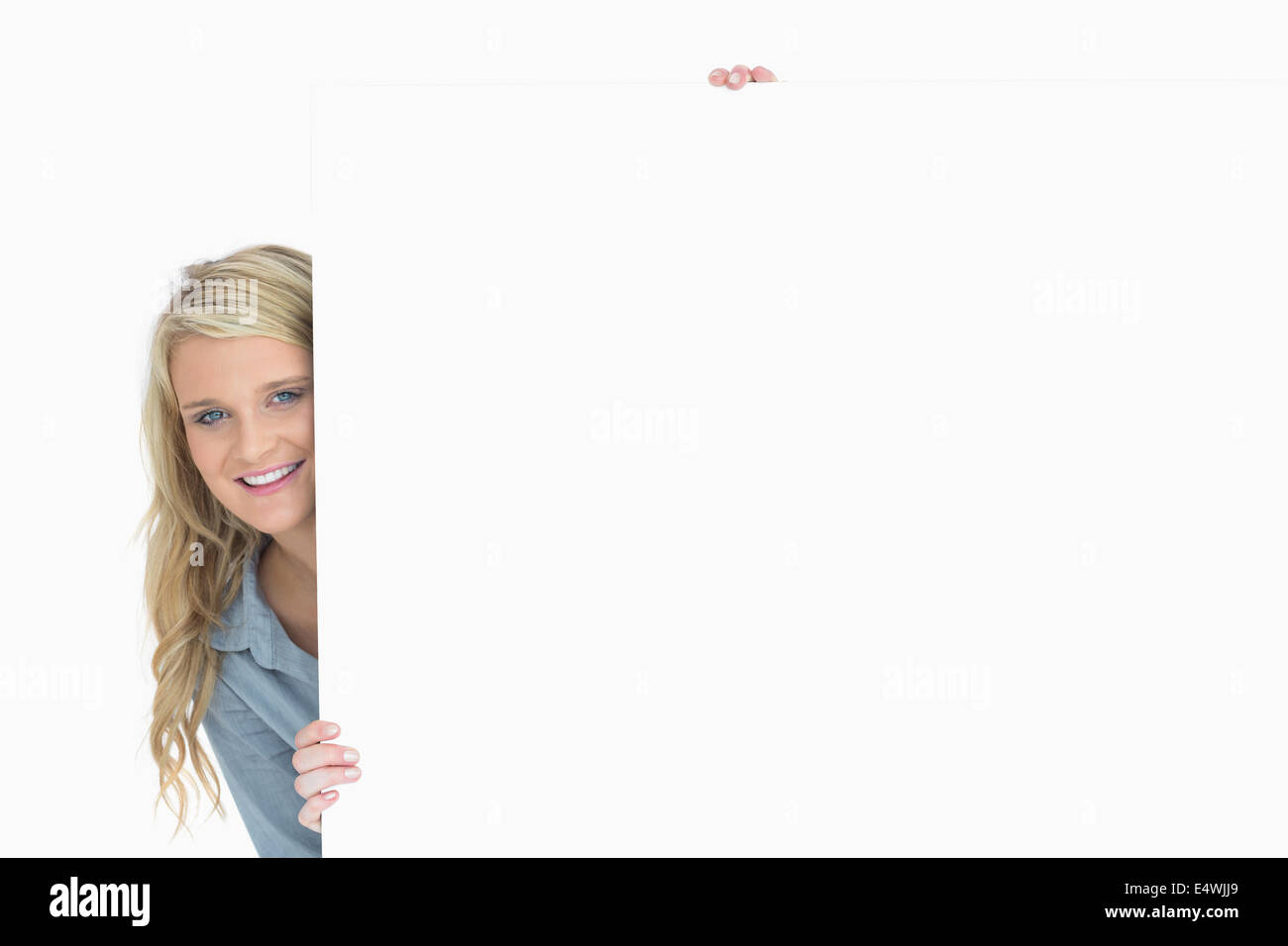 Woman behind white paper hi-res stock photography and images - Alamy