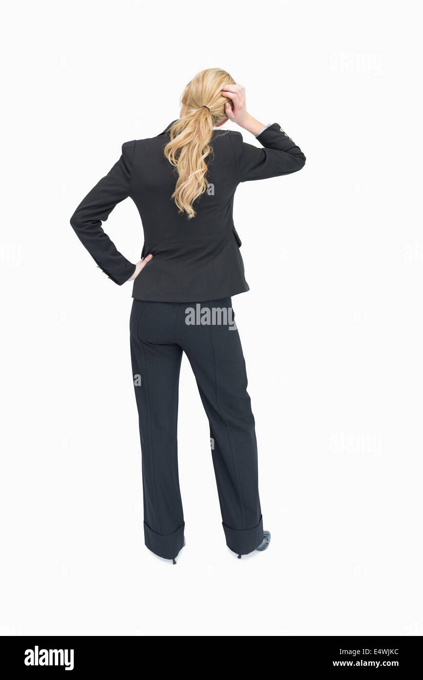 Thinking businesswoman backwards Stock Photo - Alamy