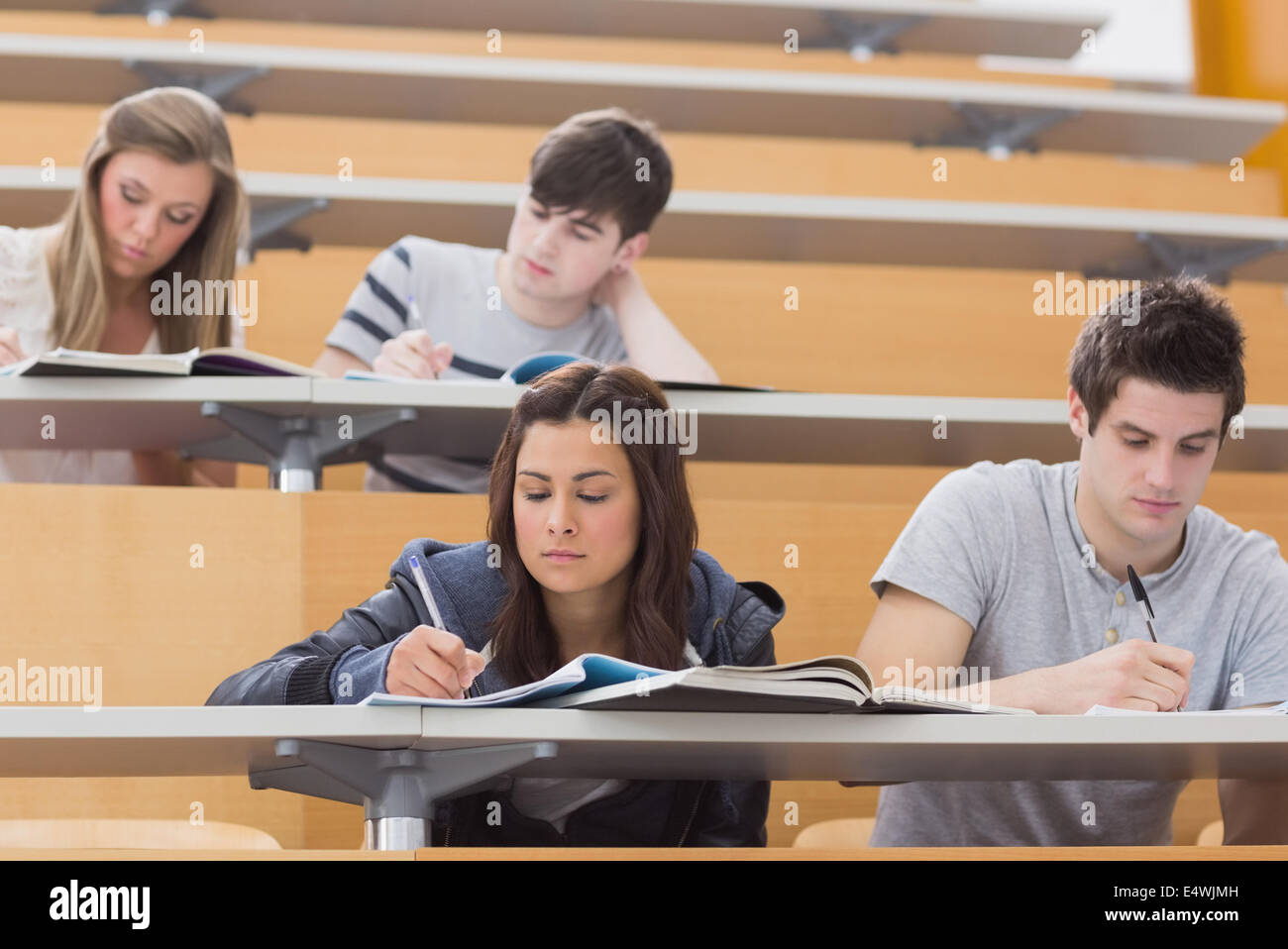 Students at their desks hi-res stock photography and images - Alamy