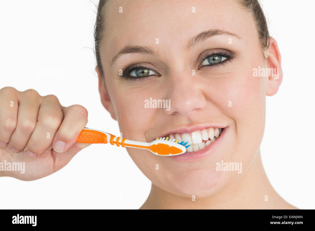 Woman washing her teeth Stock Photo - Alamy