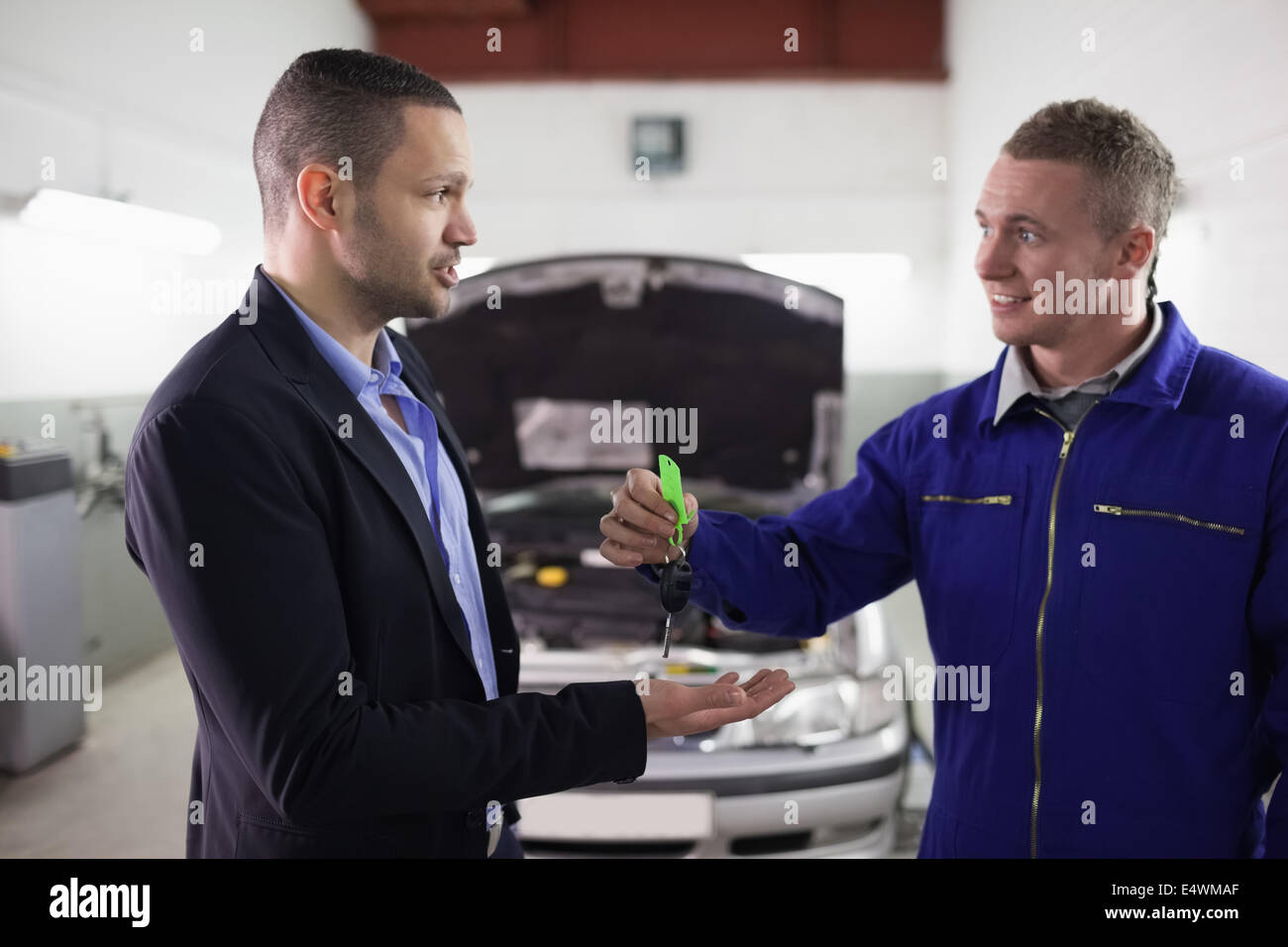 Giving a key car hi-res stock photography and images - Alamy