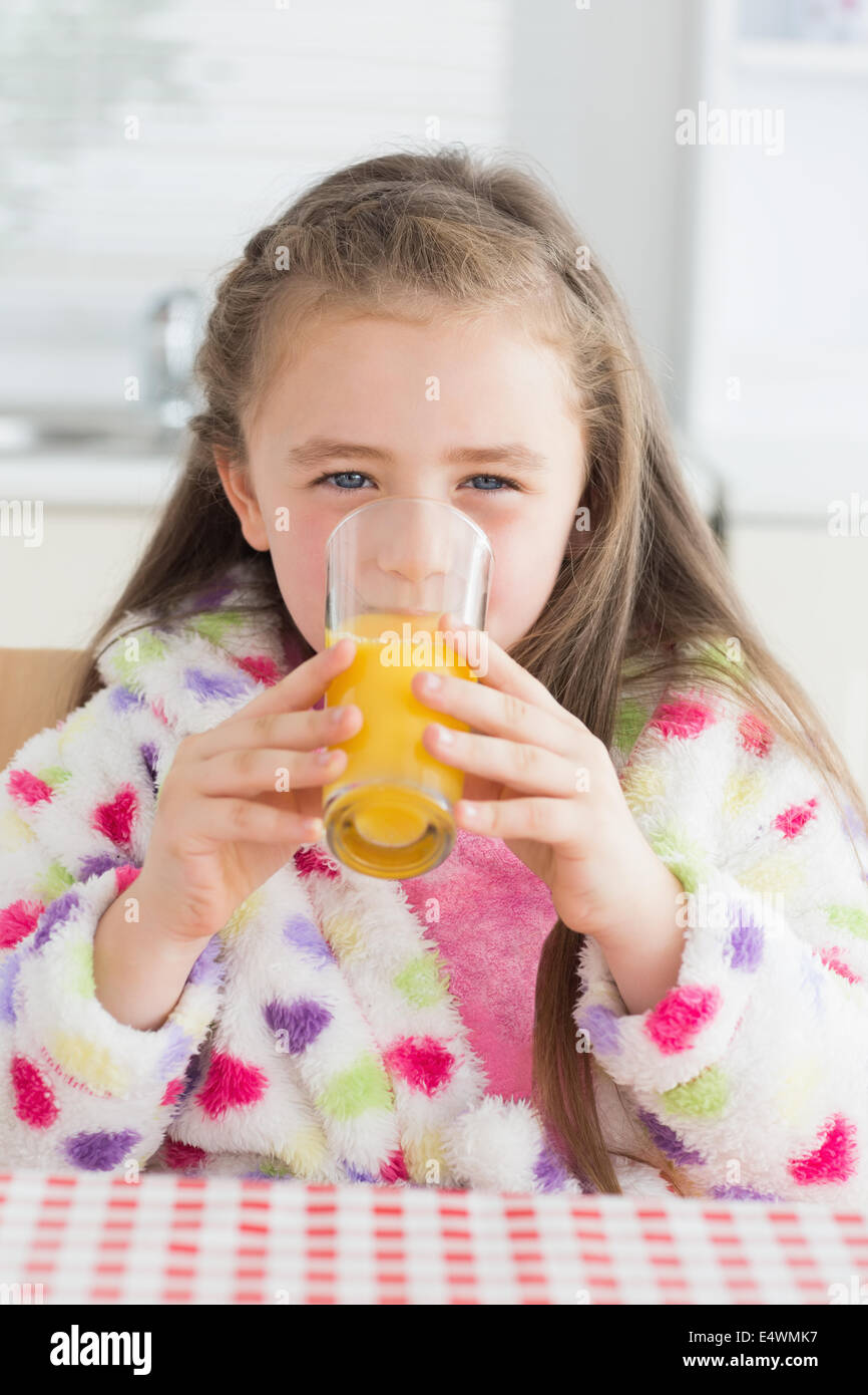 Girl drinking juice Stock Photo - Alamy