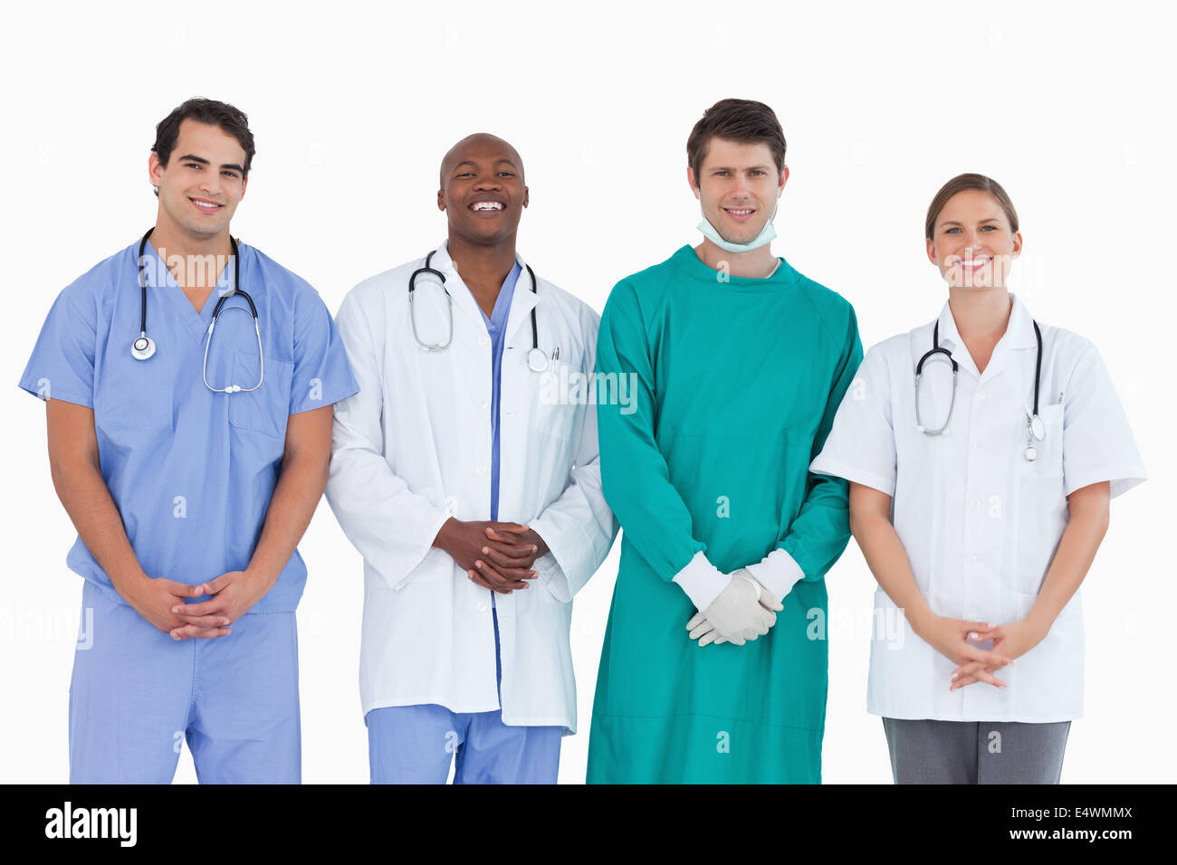Smiling medical team standing together Stock Photo - Alamy