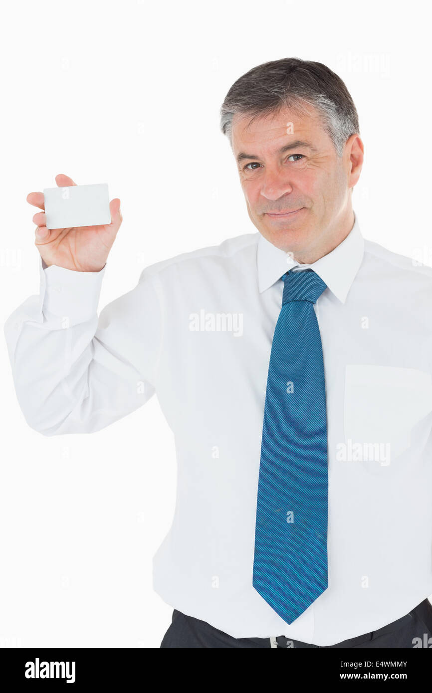 Happy businessman showing his card Stock Photo - Alamy