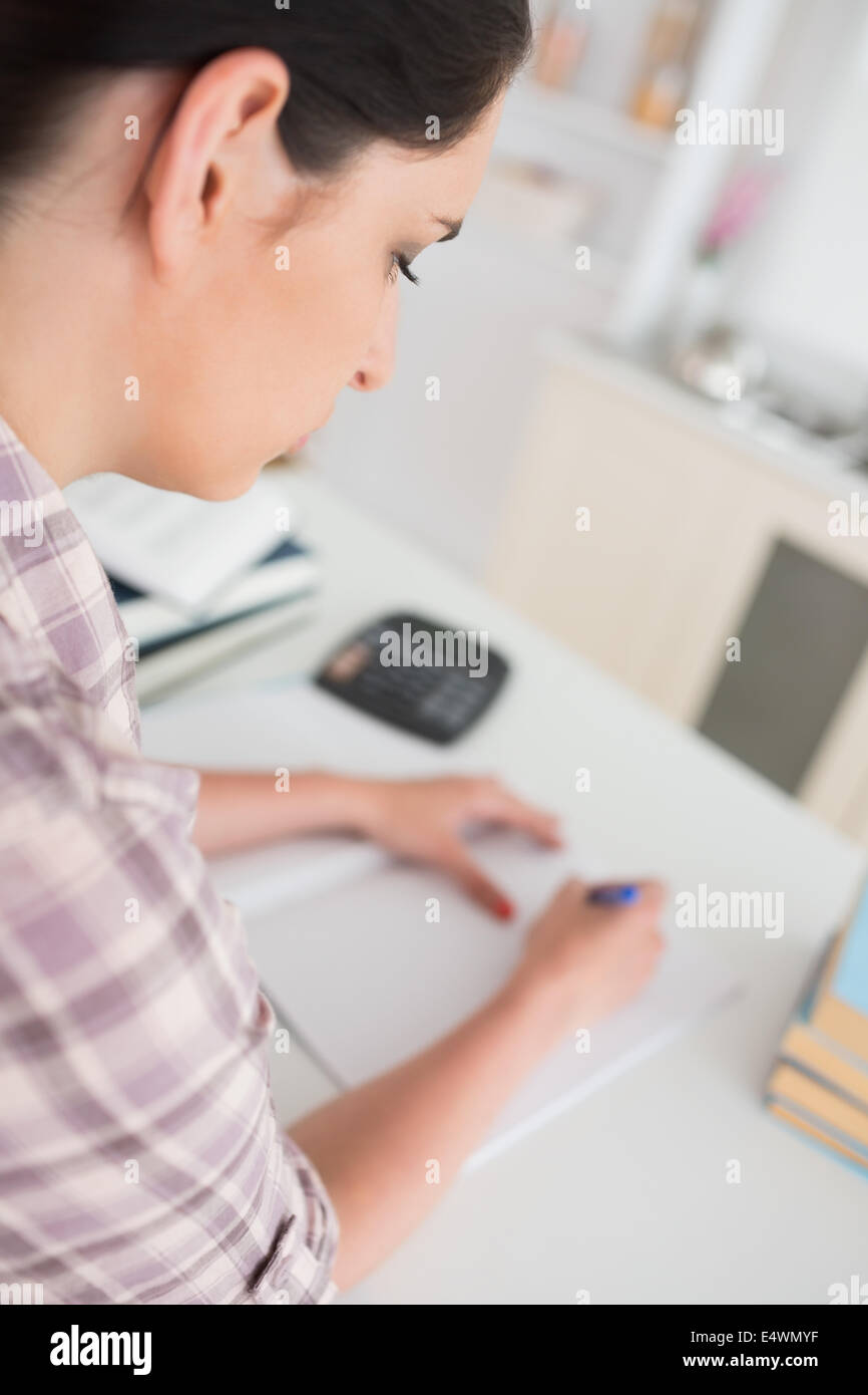 Focus on a woman working Stock Photo - Alamy