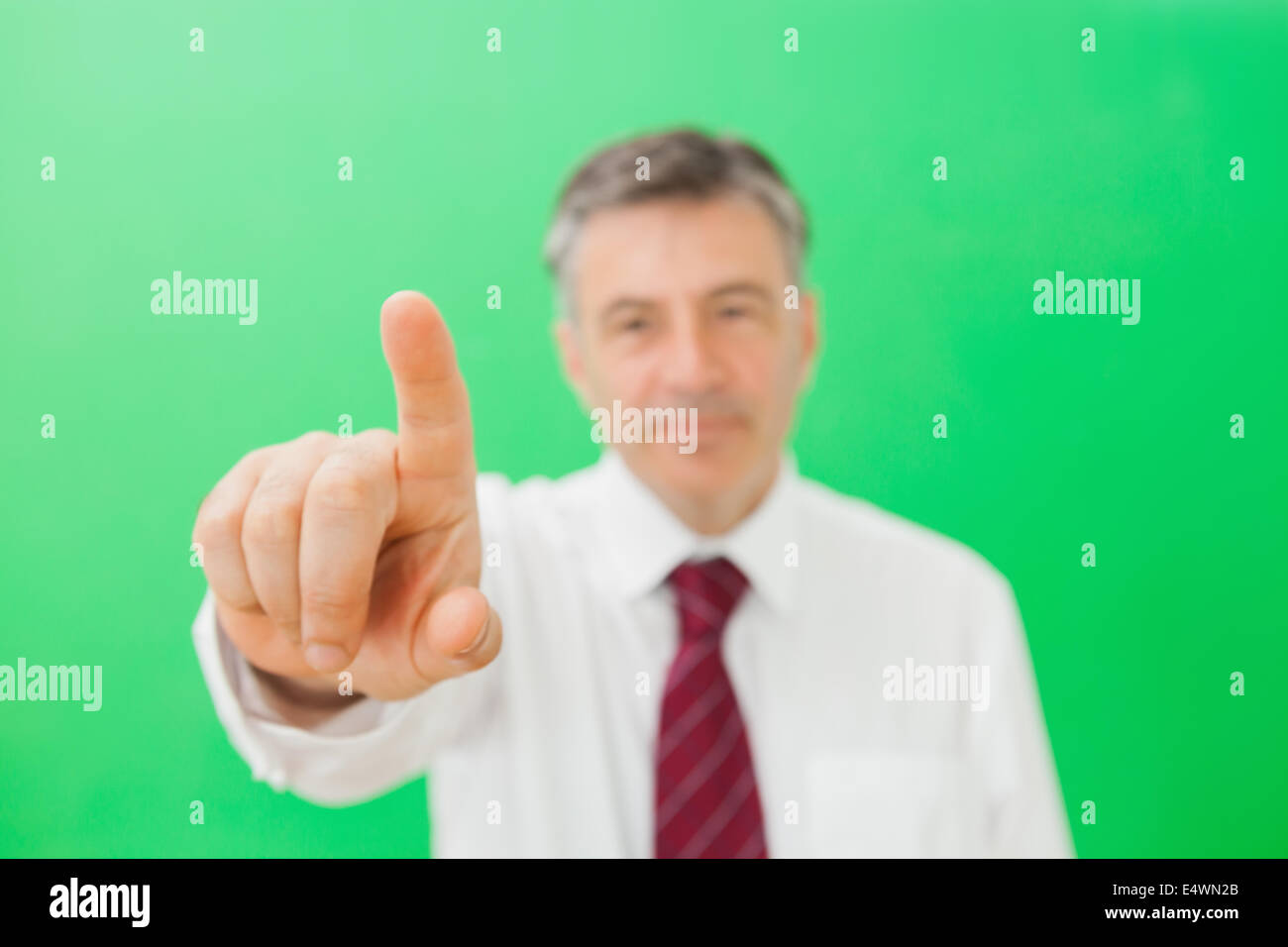 Green screen man pointing camera hi-res stock photography and images ...