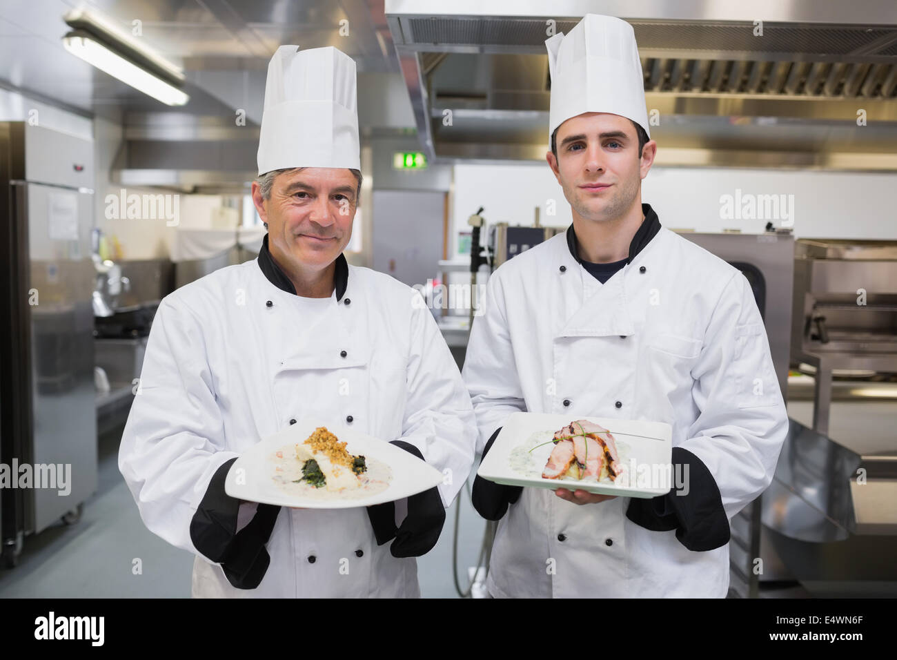 Male Chef's presenting their dishes Stock Photo - Alamy
