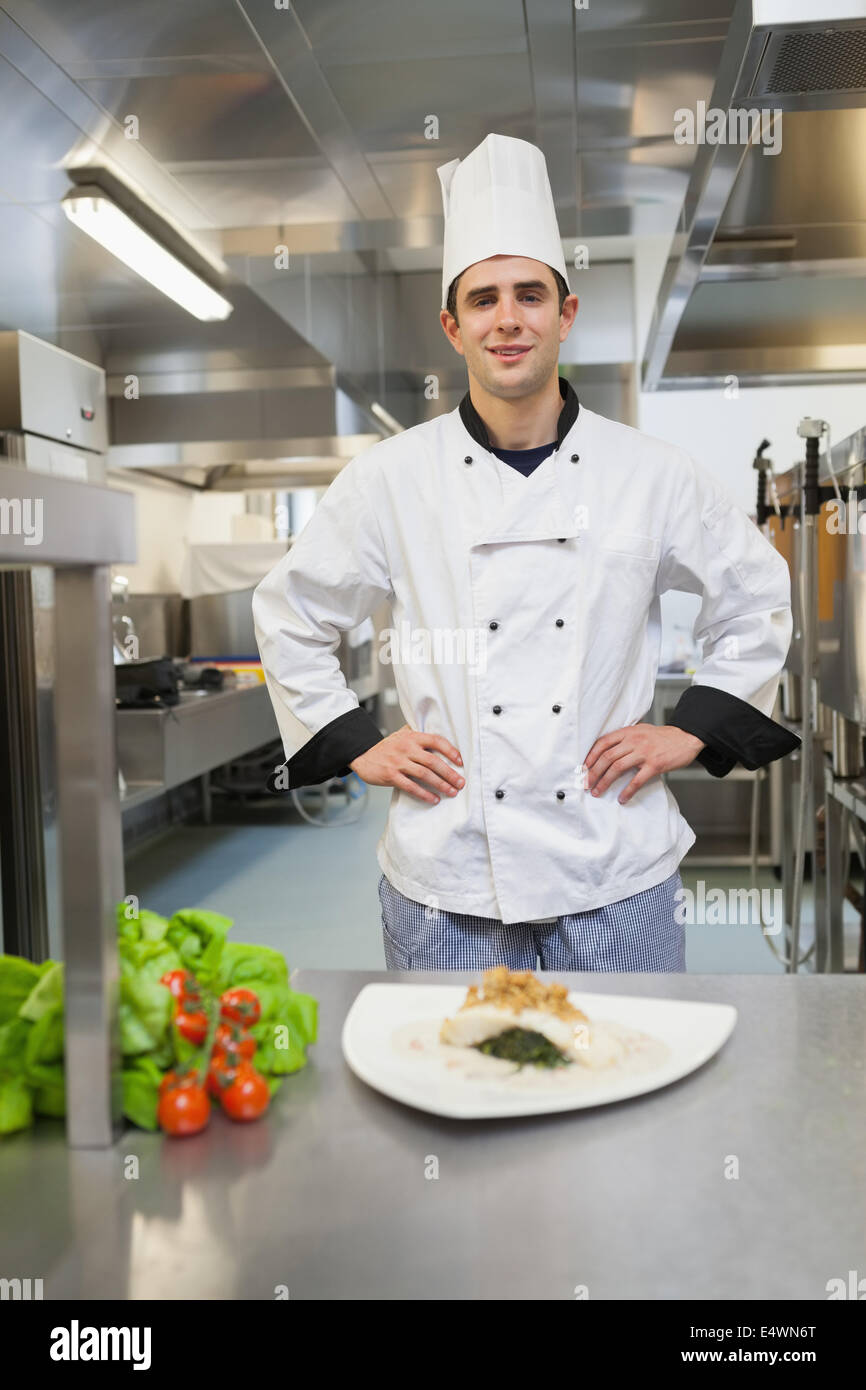 Chef standing behind his dish Stock Photo - Alamy
