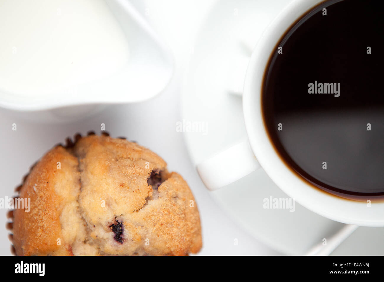 Cup of coffee with muffin Stock Photo - Alamy
