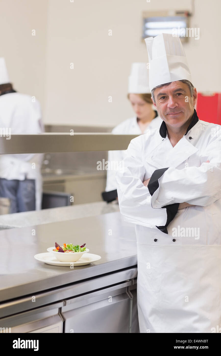 Smiling chef with his salad Stock Photo - Alamy