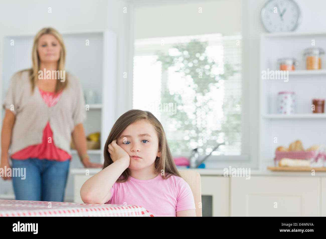 Child kitchen table looking angry hi-res stock photography and images ...