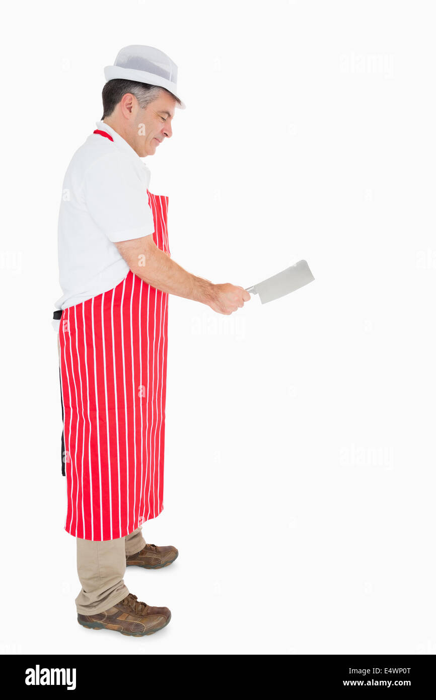 Butcher using meat cleaver Stock Photo - Alamy