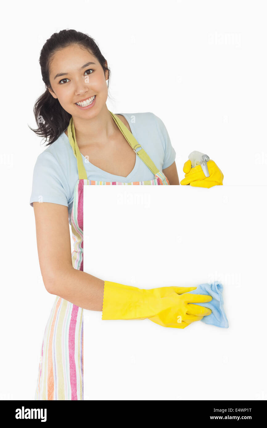 Woman wiping down surface hi-res stock photography and images - Alamy