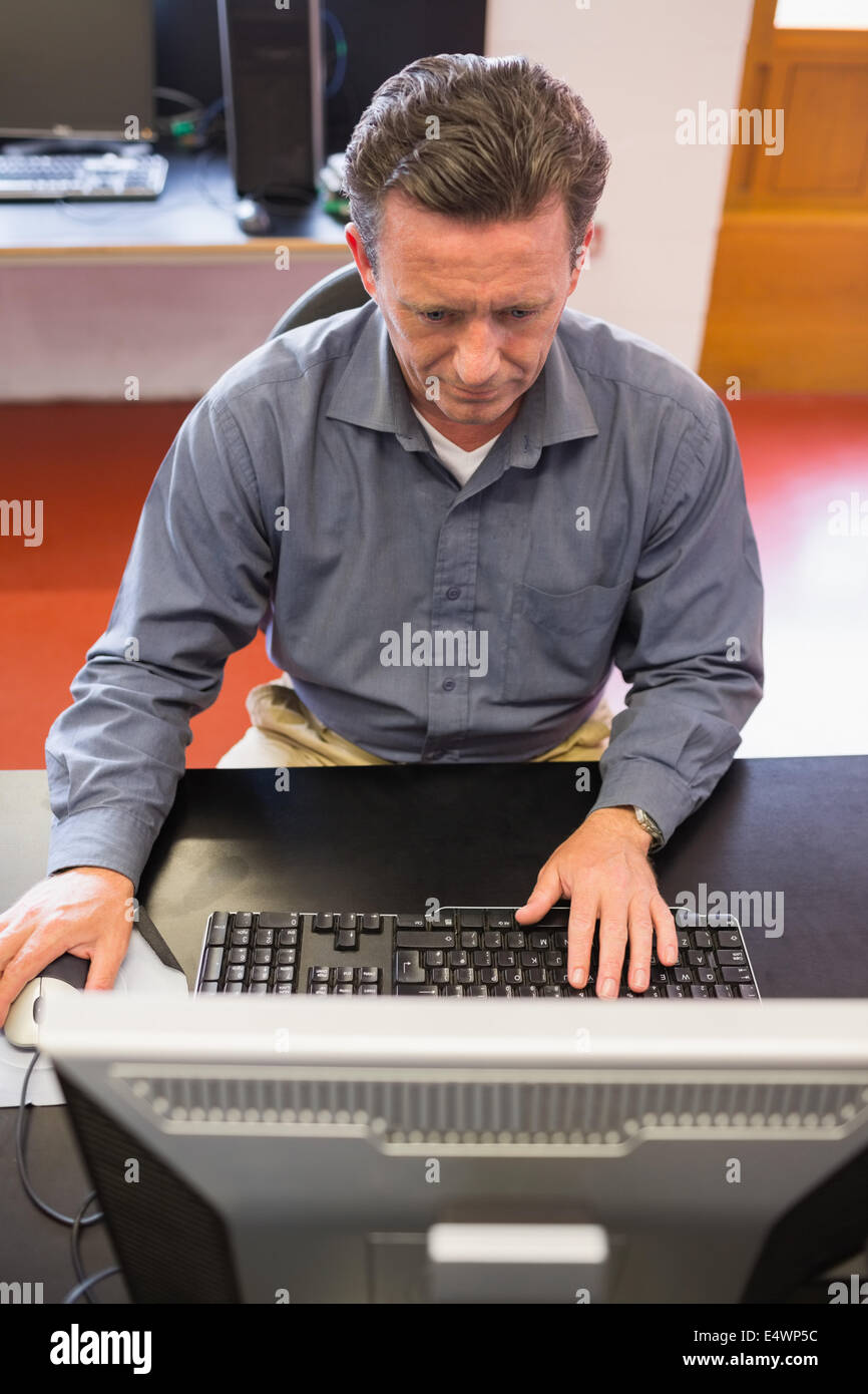 Concentrating man working at the computer Stock Photo - Alamy