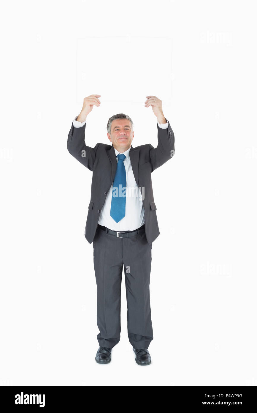 Businessman with hands up Stock Photo - Alamy