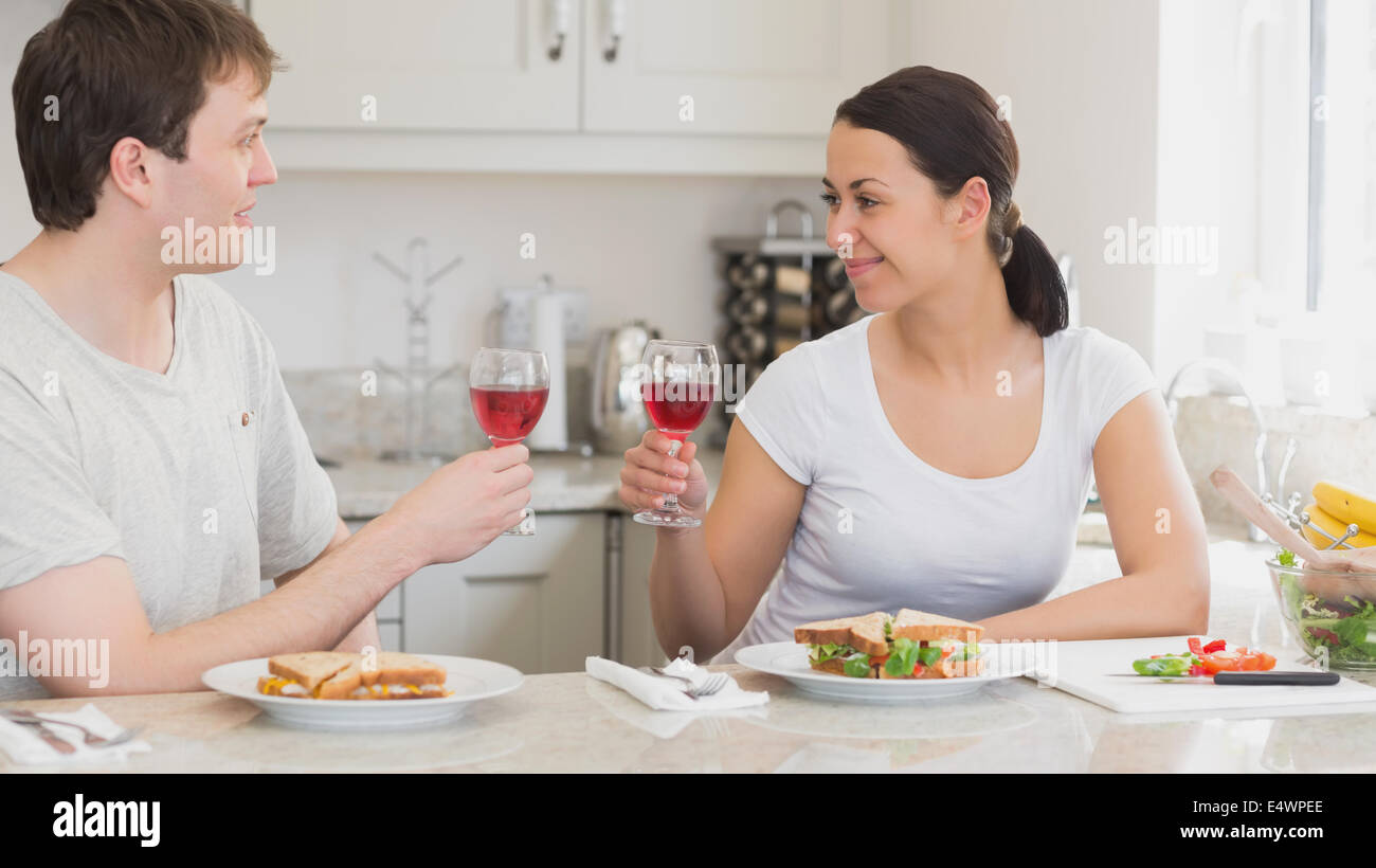 Young people having lunch Stock Photo - Alamy