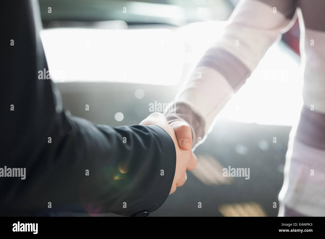 Two people shaking hand Stock Photo - Alamy