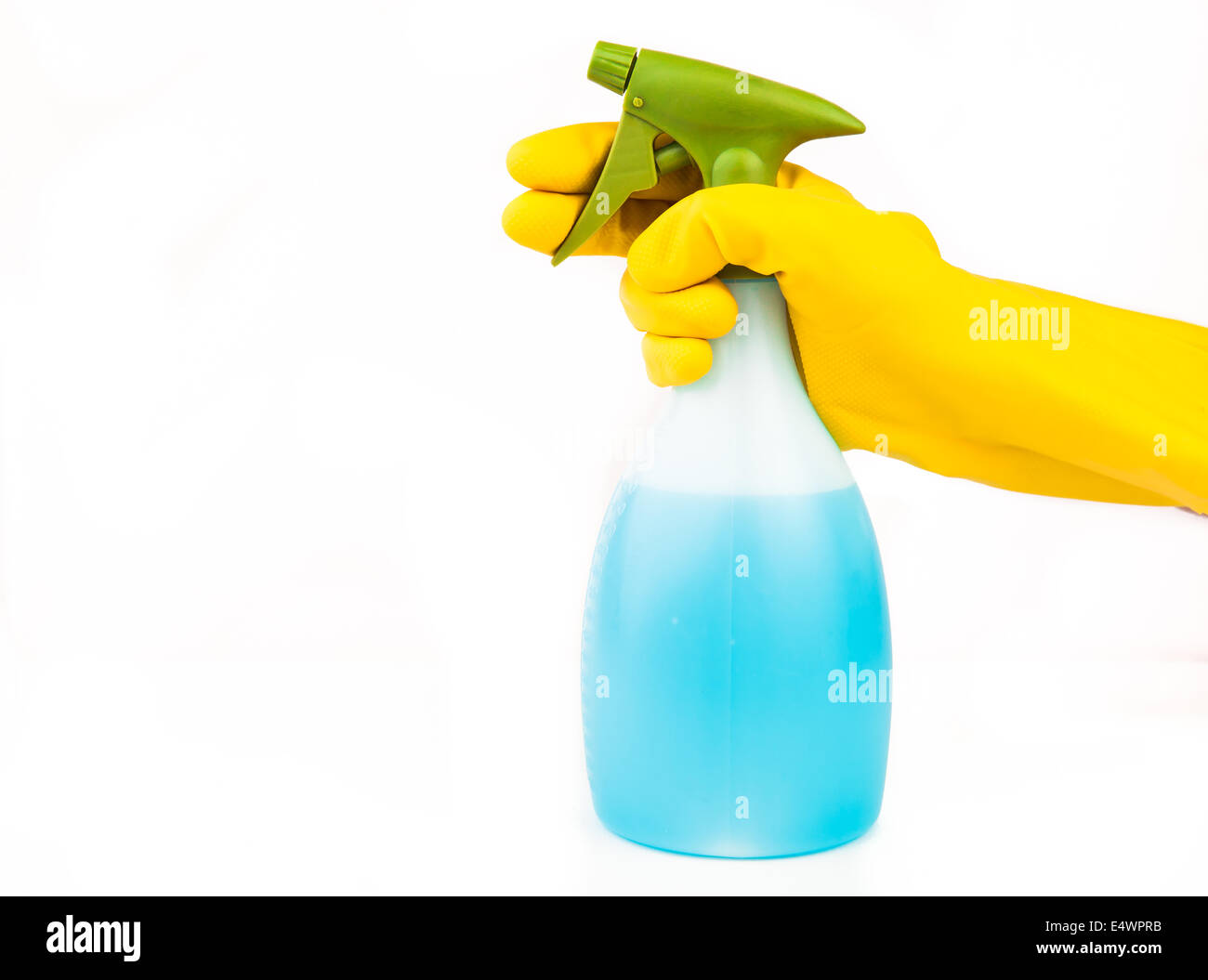 Hand holding spray bottle Stock Photo - Alamy