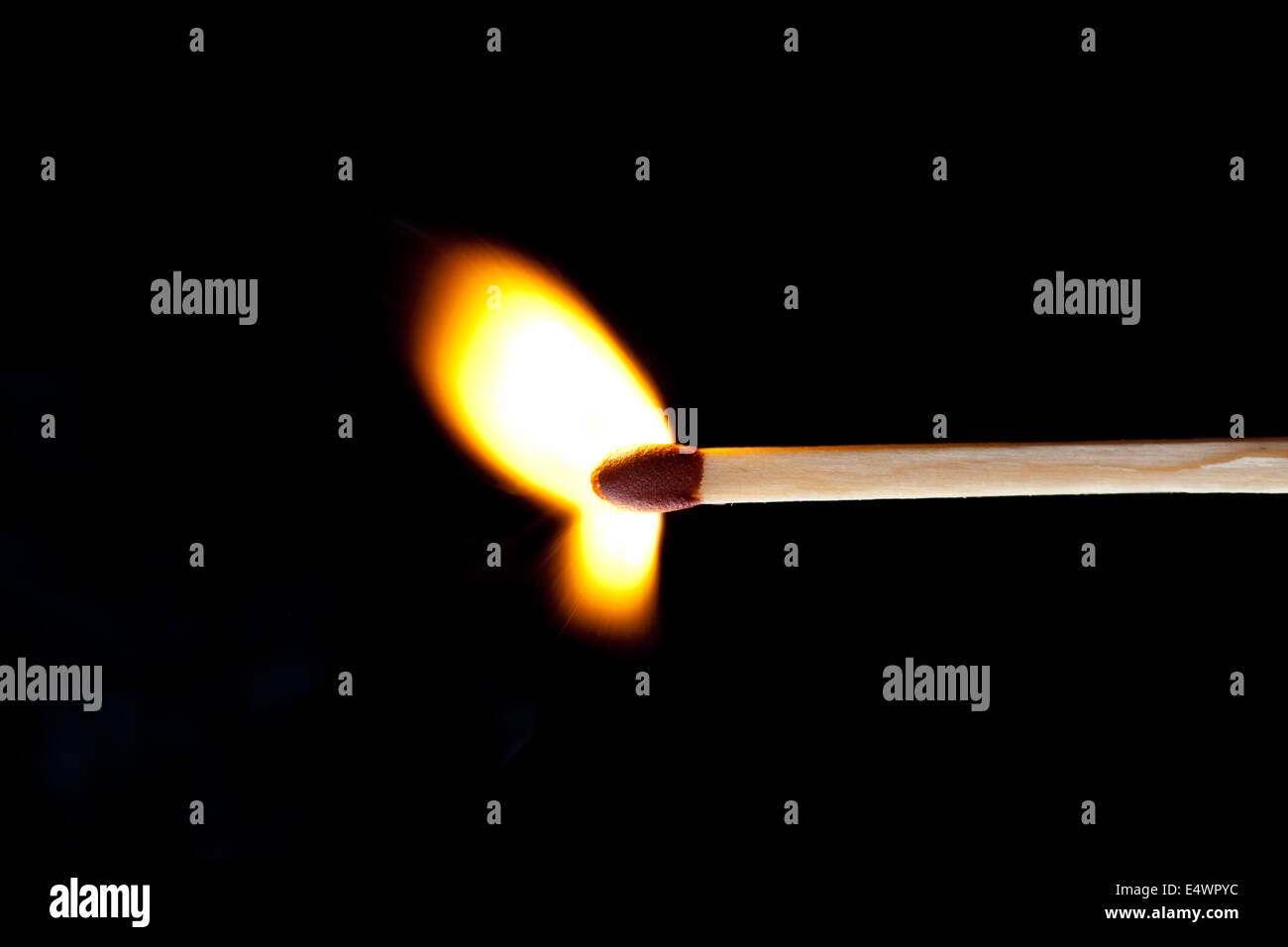 Horizontal match set on fire Stock Photo - Alamy