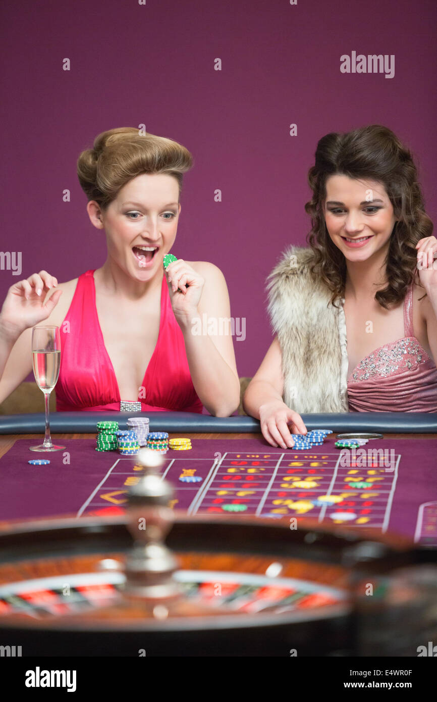 Women winning at roulette Stock Photo - Alamy