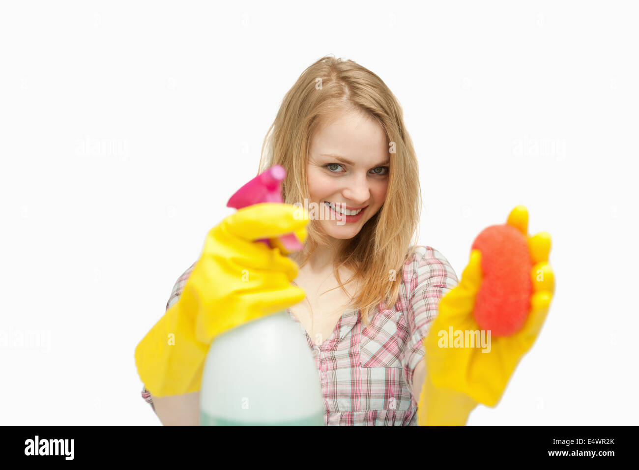 Woman holding cleaning agents Stock Photo - Alamy