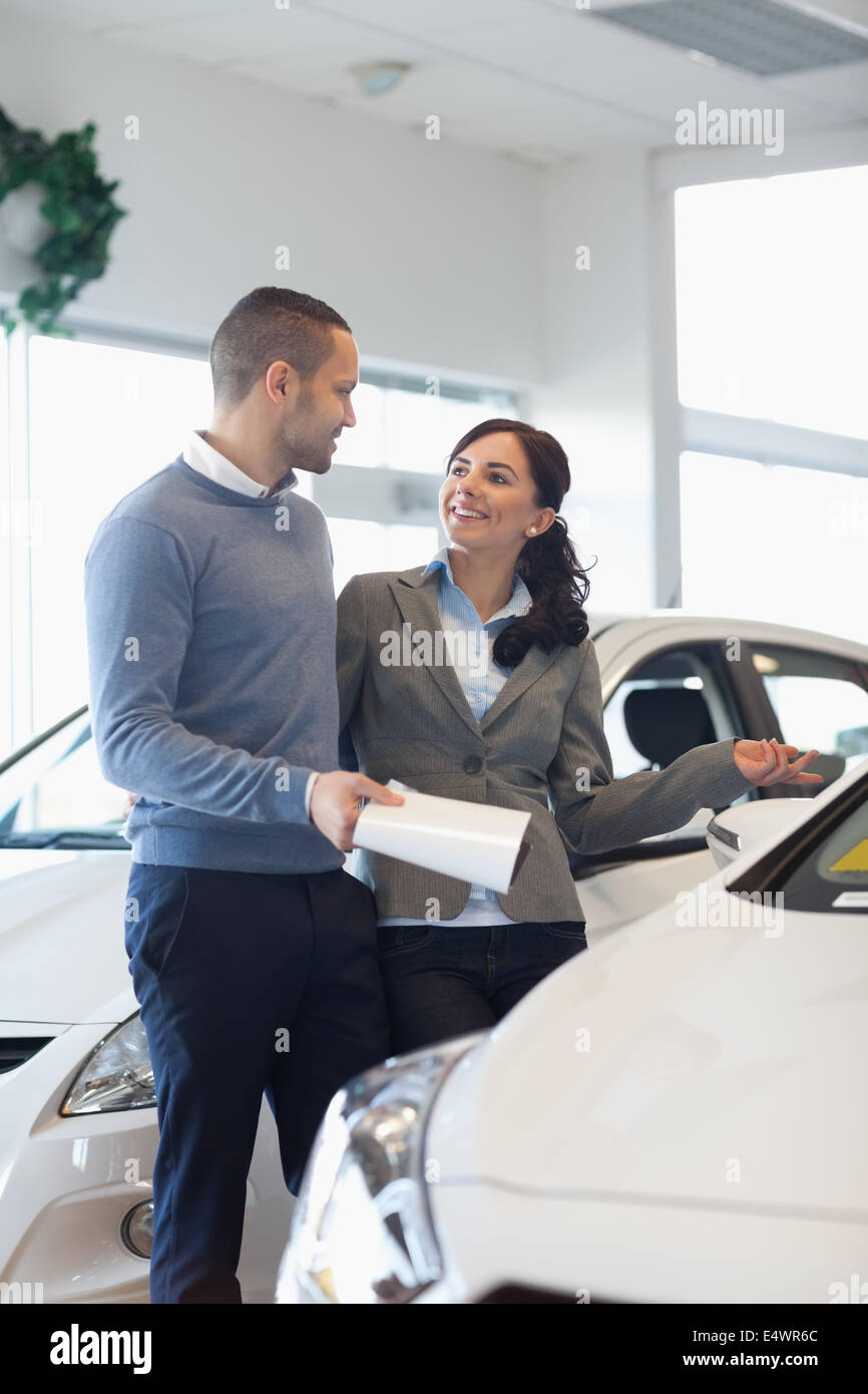 Couple talking together Stock Photo - Alamy