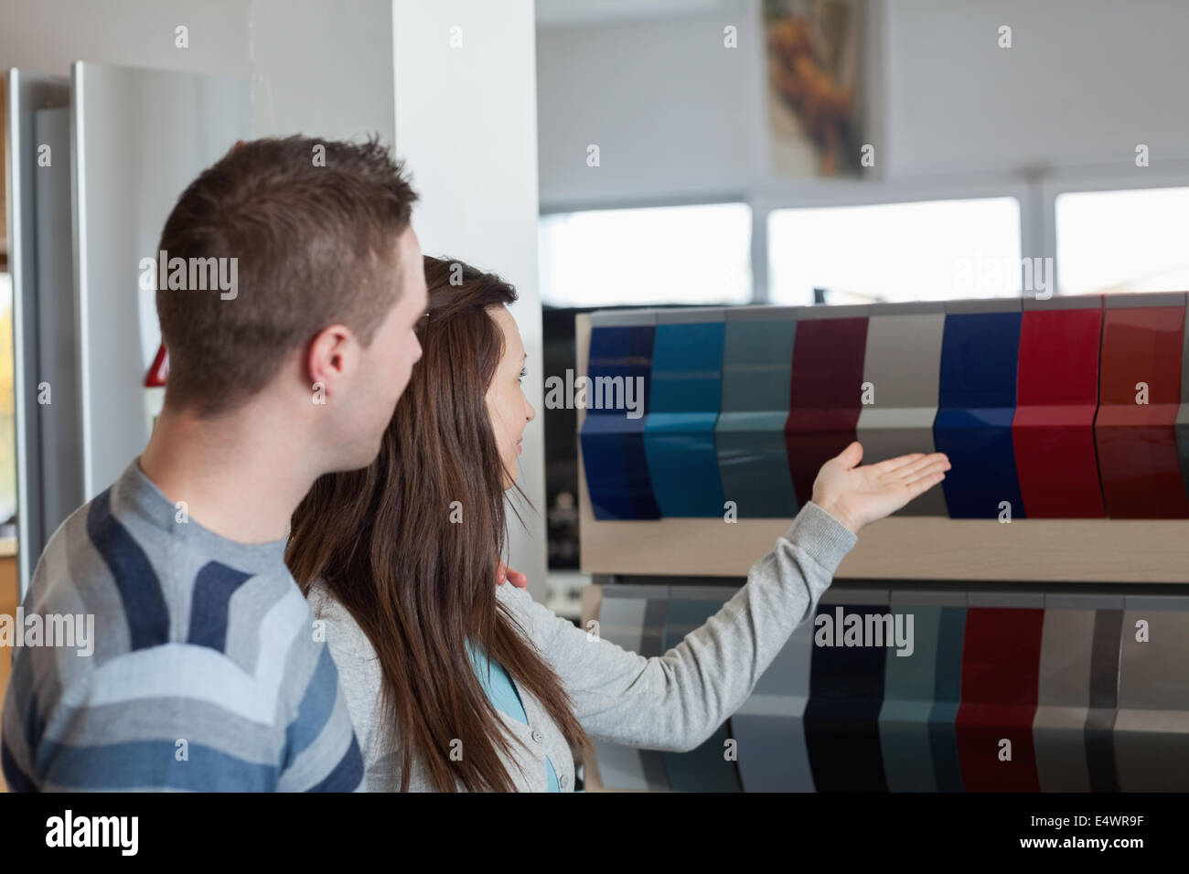 Customers watching different colours Stock Photo - Alamy