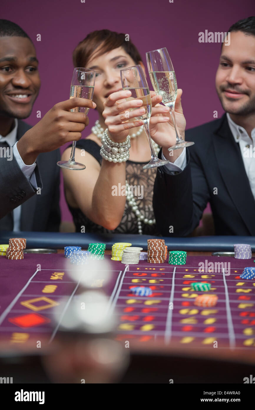 Three people playing roulette hi-res stock photography and images - Alamy