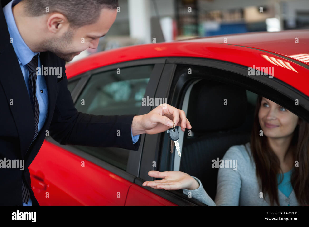 Client receiving car keys Stock Photo - Alamy