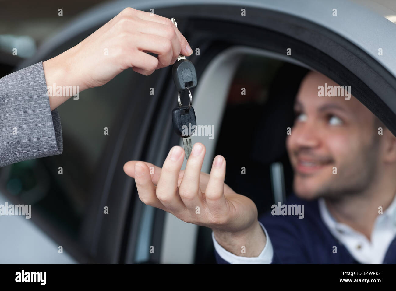 Man receiving car keys Stock Photo - Alamy
