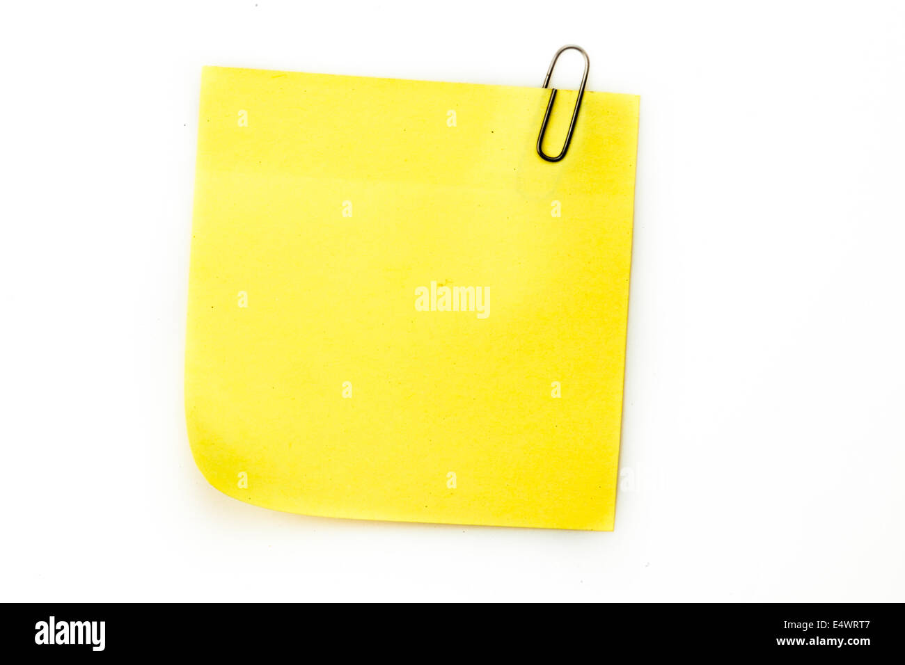 Sticky note with grey paperclip Stock Photo - Alamy