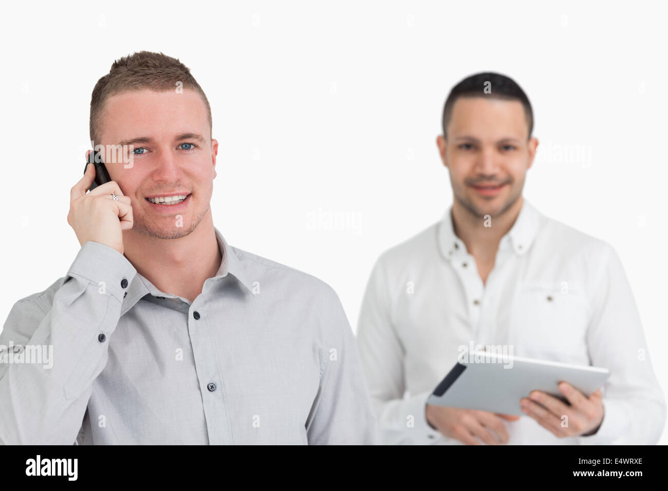 Two people speaking smart phone hi-res stock photography and images - Alamy
