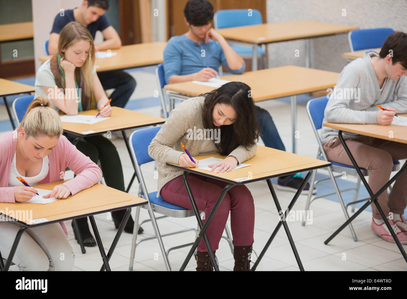 Students writing in the exam hall Stock Photo - Alamy Students writing in the exam hall Stock Photo - Alamy