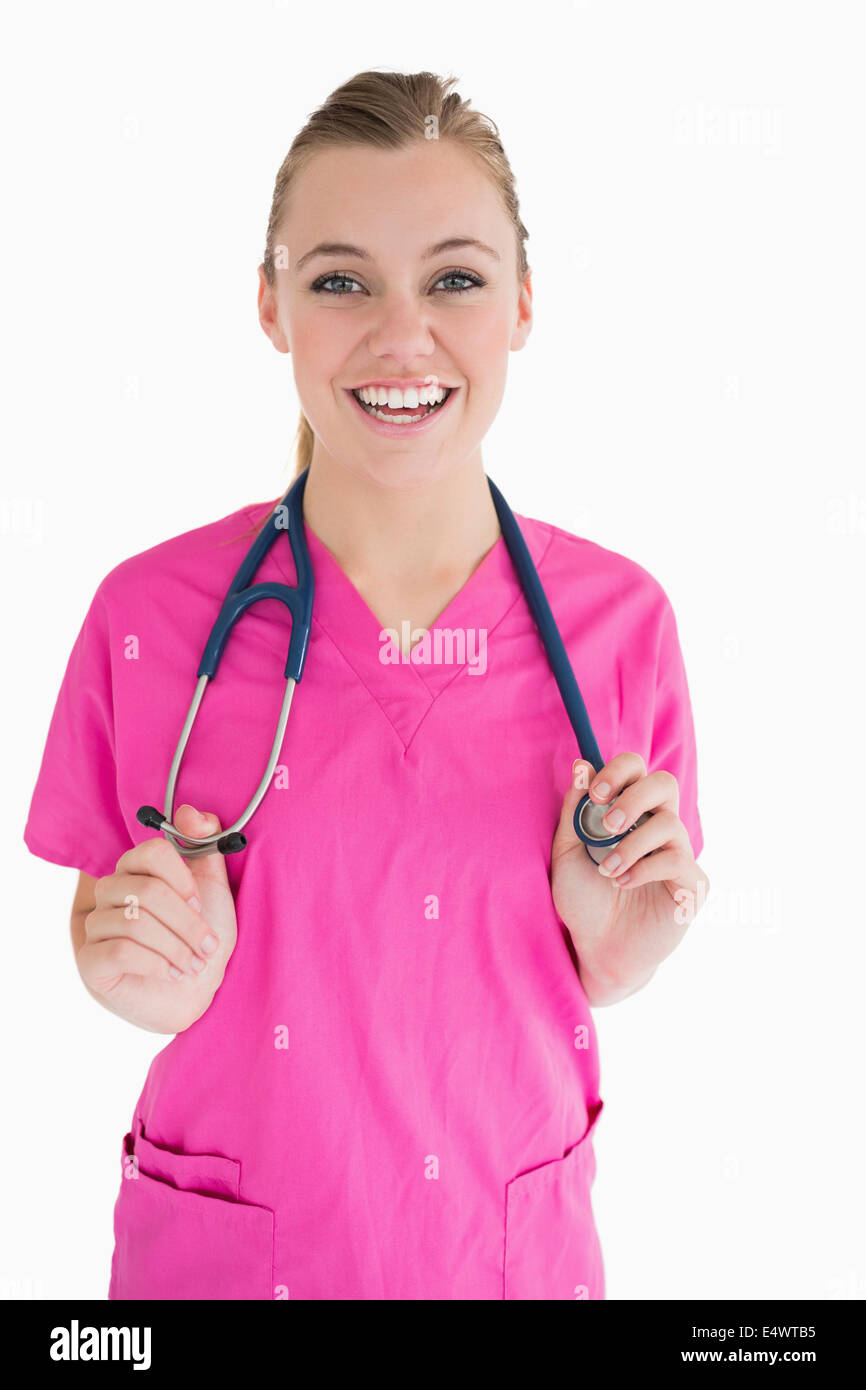 Smiling doctor with pink scrubs Stock Photo - Alamy