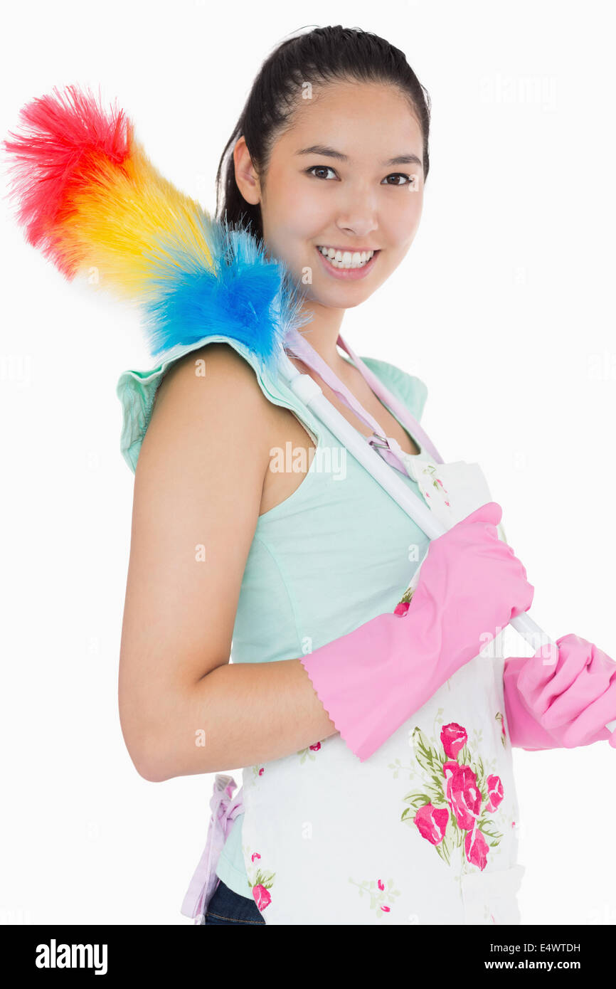 Woman feather duster cleaning hi-res stock photography and images - Alamy