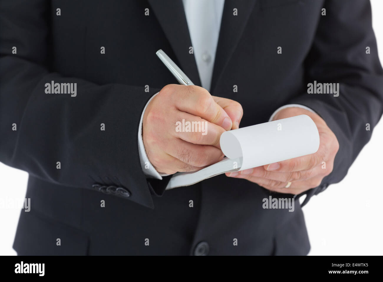 Waiter writing in notepad Stock Photo - Alamy