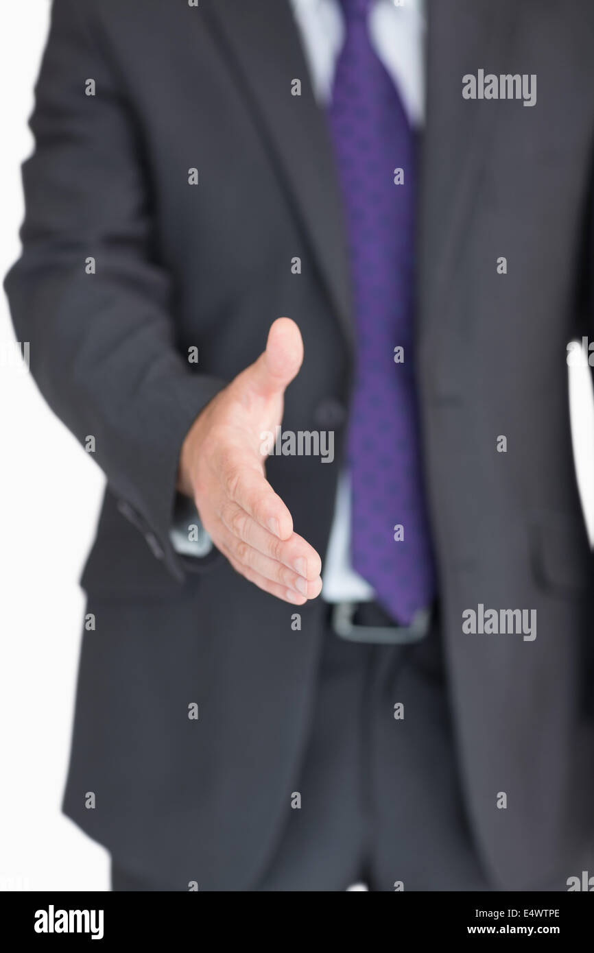 Businessman extending hand handshake hi-res stock photography and images - Alamy