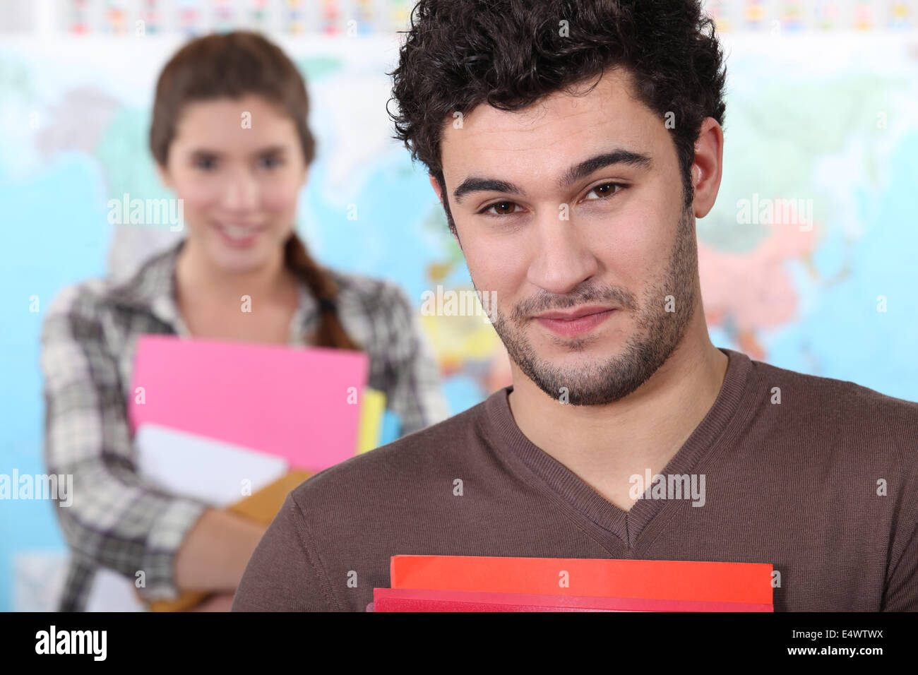 Two college students in class Stock Photo - Alamy