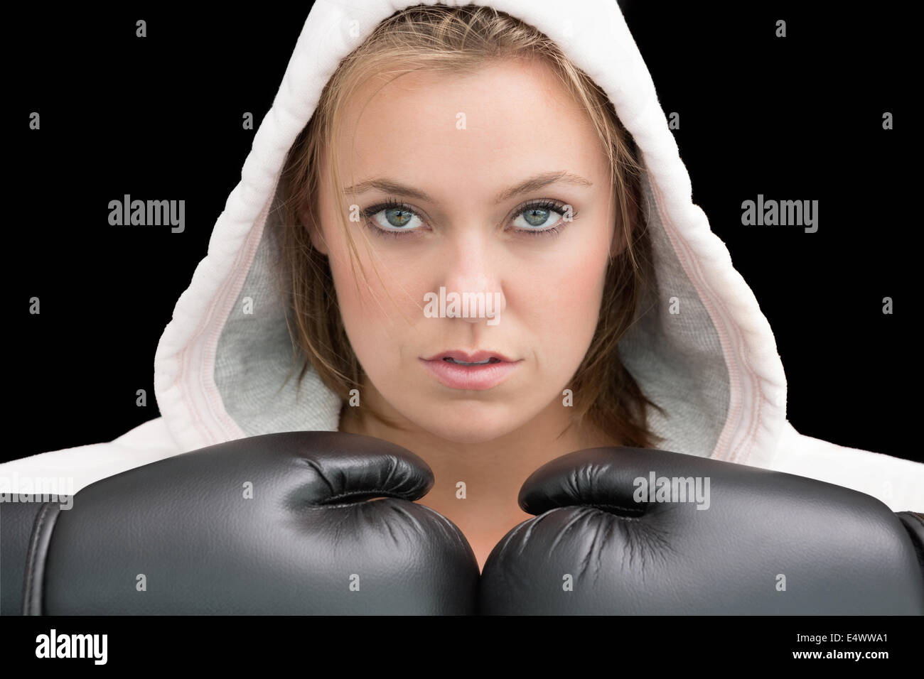 Woman wearing boxing gloves and robe Stock Photo - Alamy