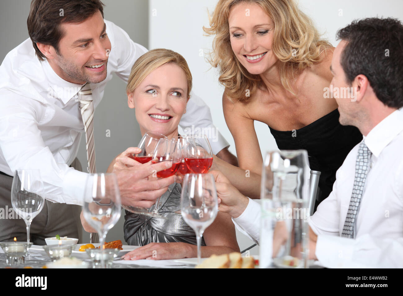 Toast with friends Stock Photo - Alamy
