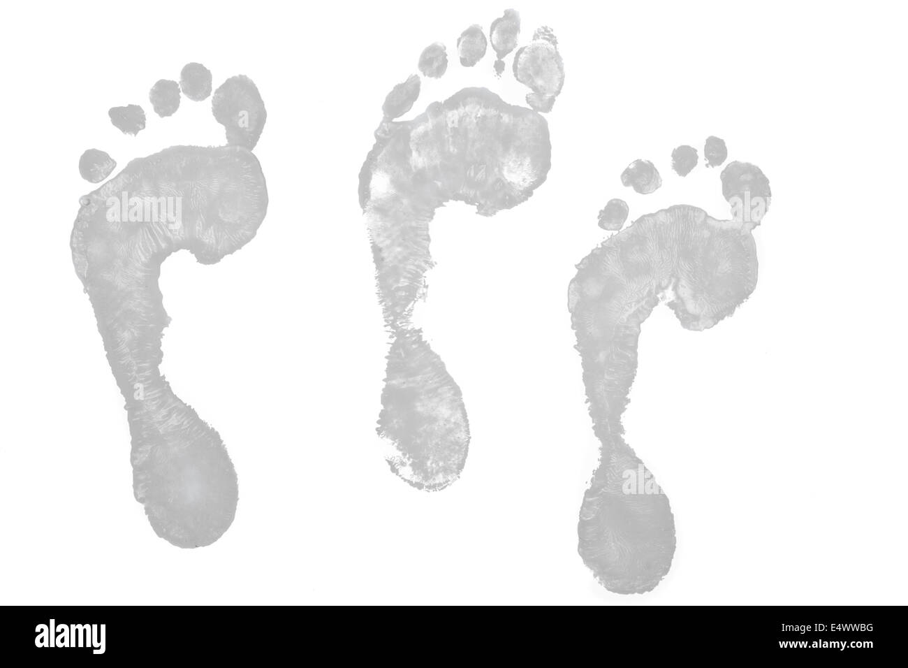 Three grey footprints Stock Photo - Alamy