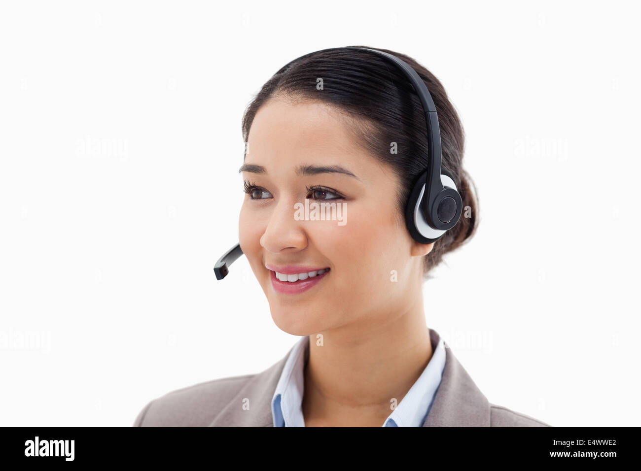 Happy operator posing with a headset Stock Photo - Alamy