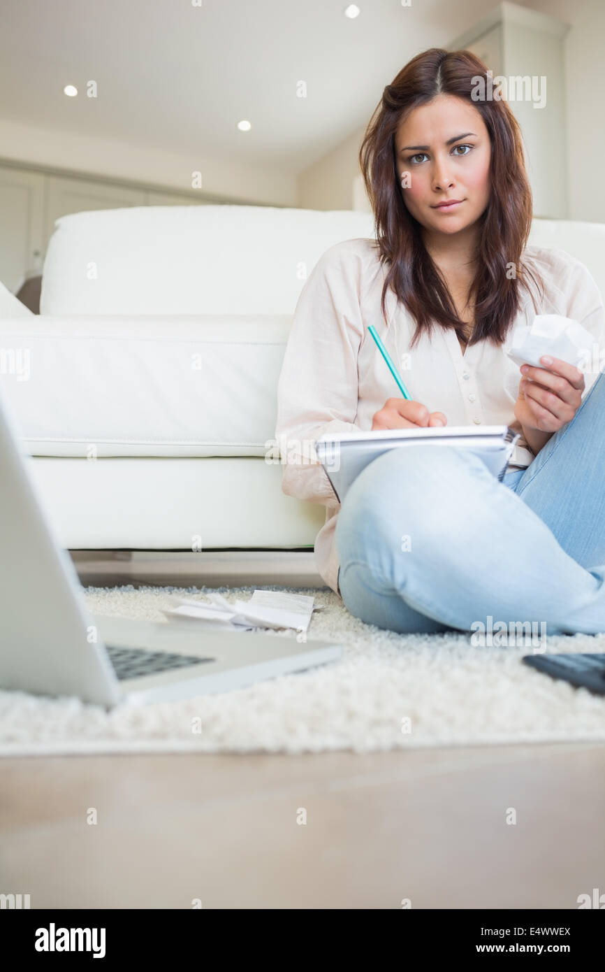 Woman checking paper bills hi-res stock photography and images - Alamy