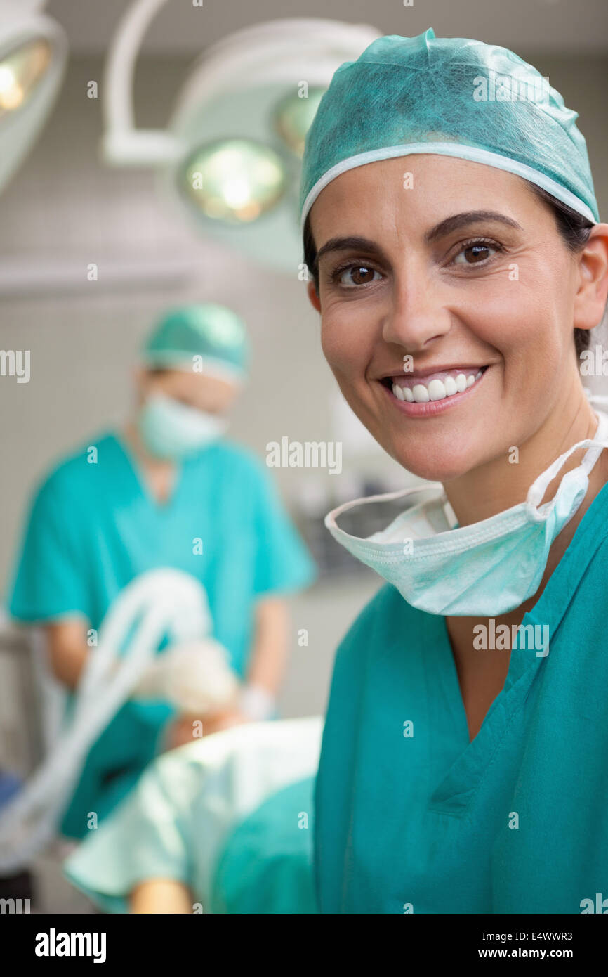 Woman surgeon smiling Stock Photo - Alamy