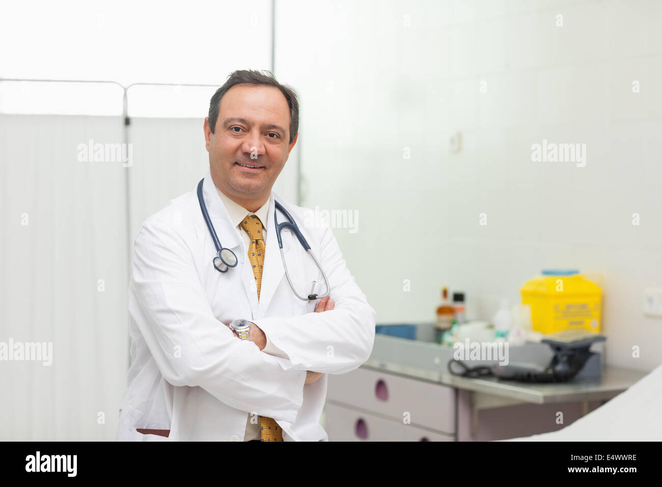 Doctor stethoscope folding arms hi-res stock photography and images - Alamy