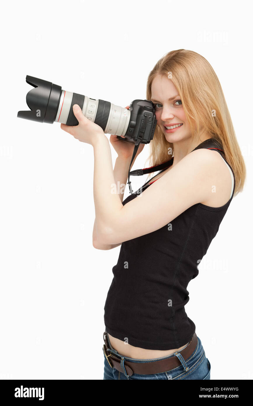 Woman holding slr hi-res stock photography and images - Alamy