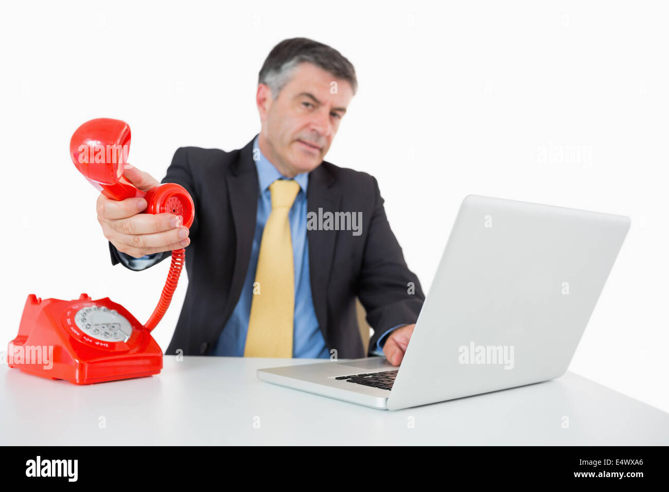 Man passing the phone to the camera Stock Photo - Alamy